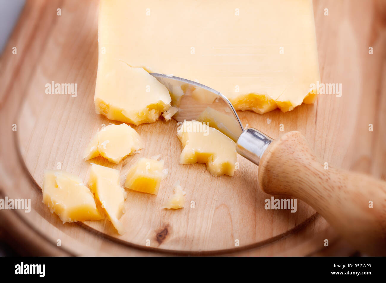 Parmesan cheese and knife Stock Photo - Alamy
