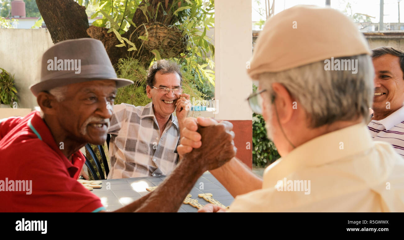 Older men shaking hands hi-res stock photography and images - Alamy