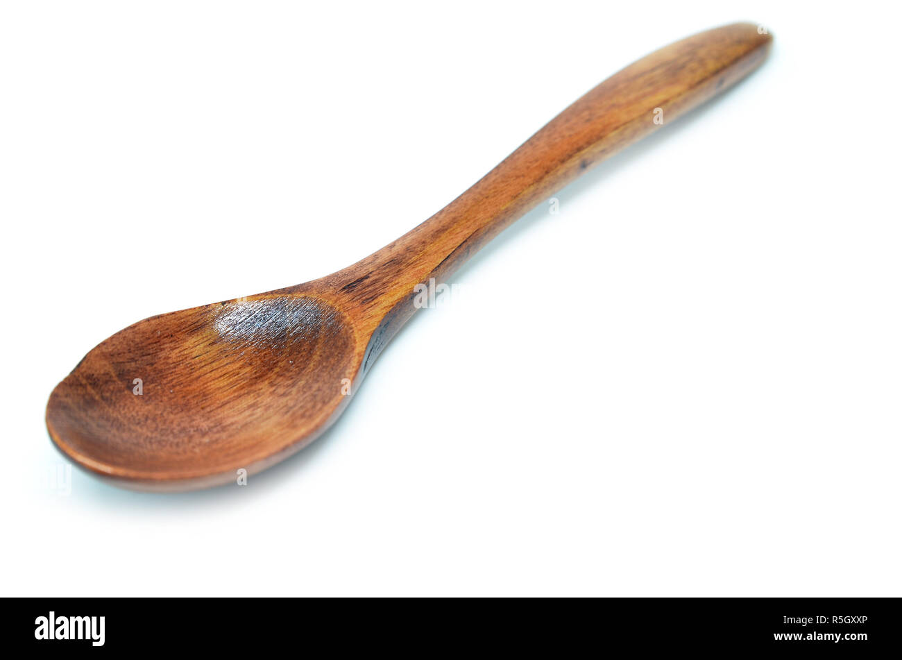 Wooden spoon isolated Stock Photo - Alamy
