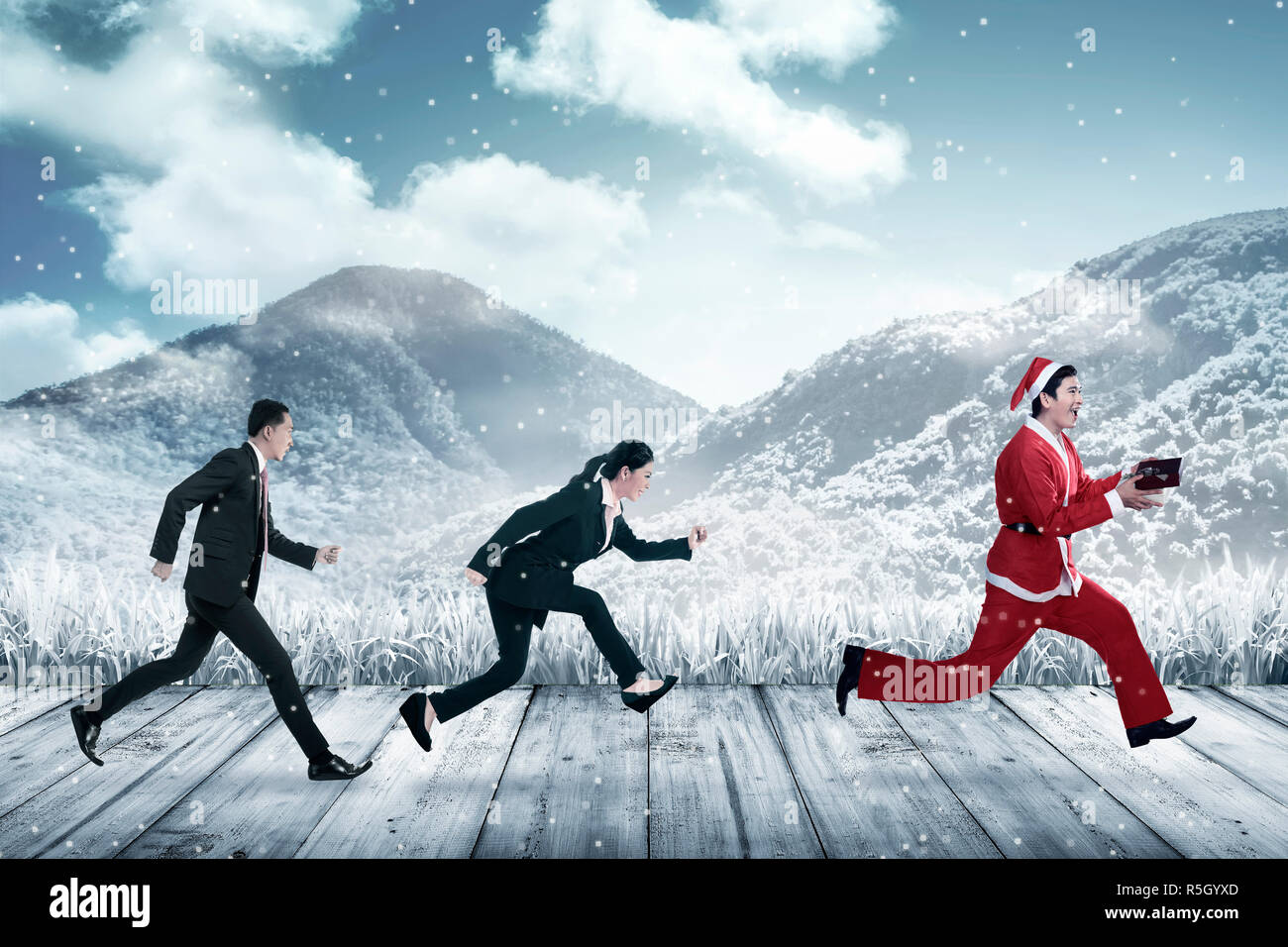 Santa bike snow hi-res stock photography and images - Alamy