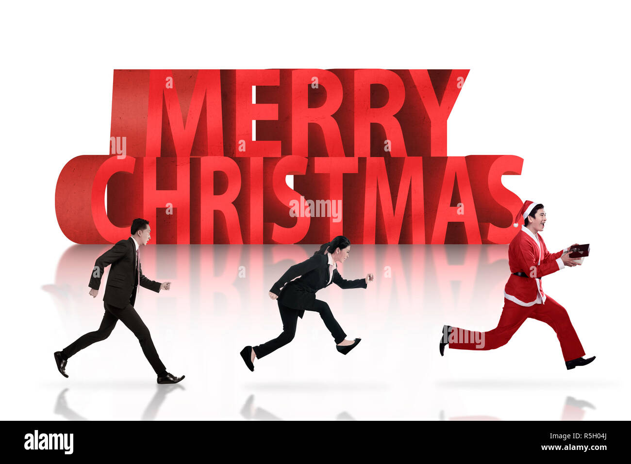 Business people chasing santa claus Stock Photo - Alamy