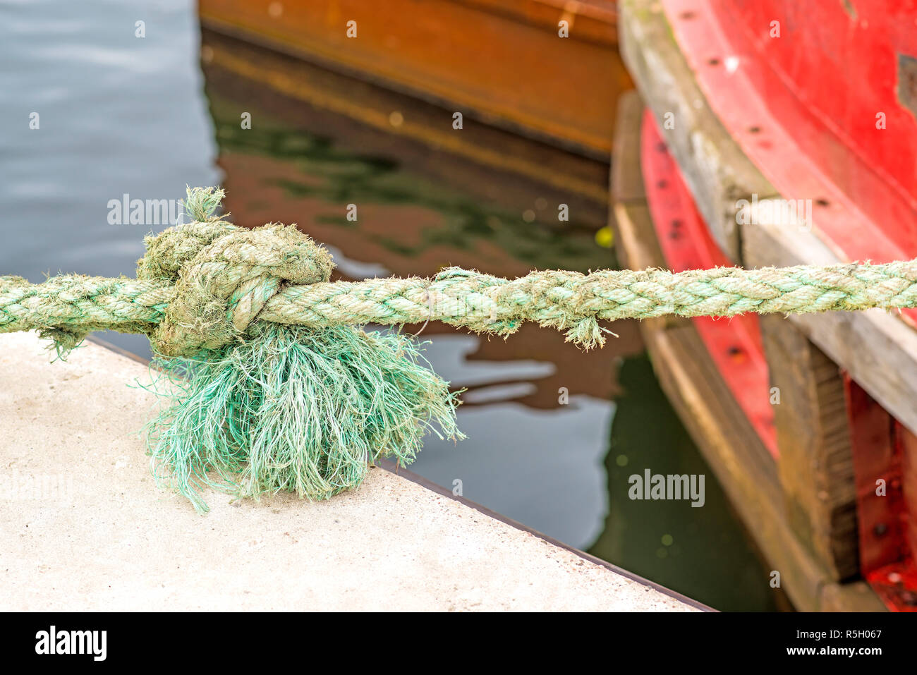 mooring line of a fishing cutter with knots Stock Photo - Alamy