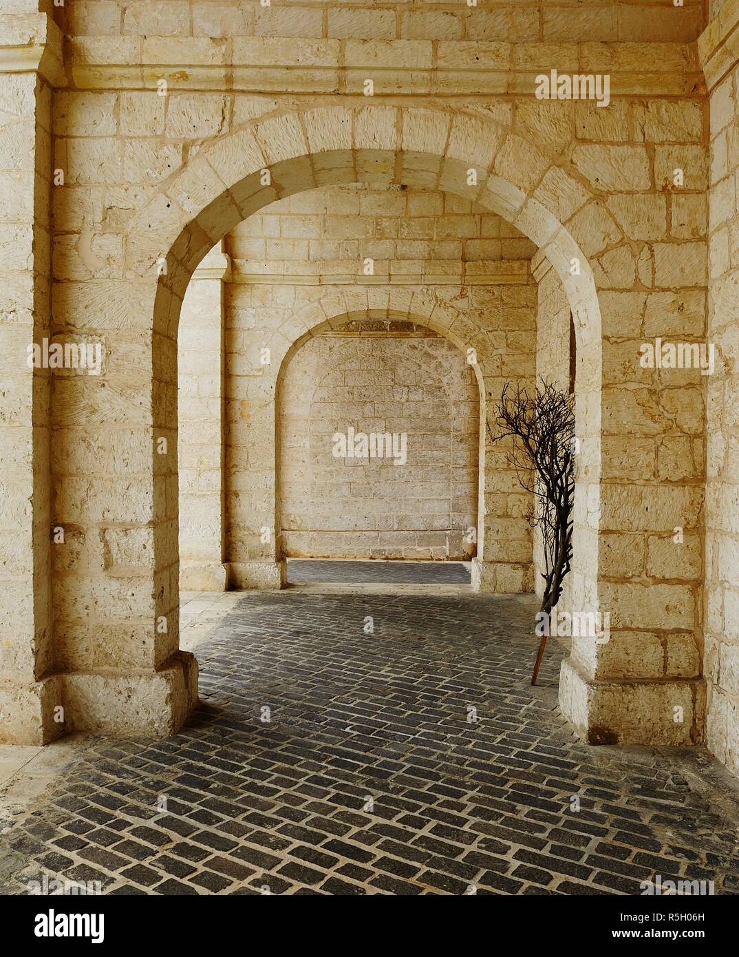 Two stone arches built in a line Stock Photo - Alamy