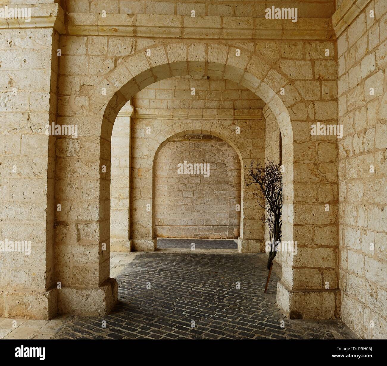 Two stone arches built in a line Stock Photo - Alamy