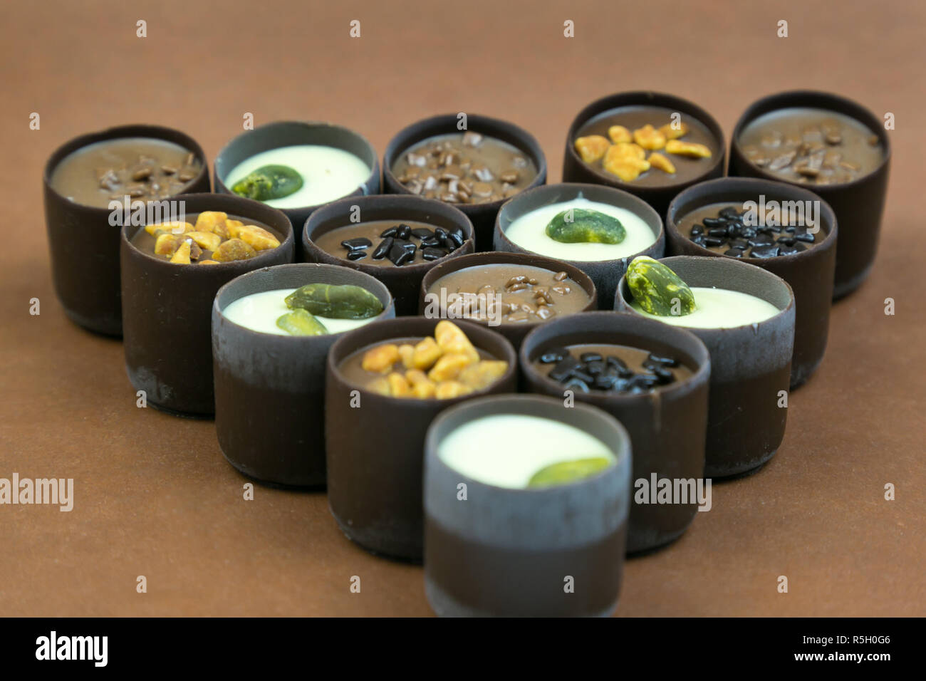 Luxury expensive candy laid out on a dark brown background Stock Photo ...