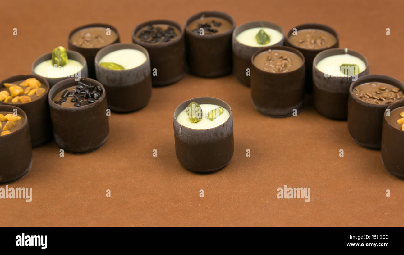 Luxury expensive candy laid out on a dark brown background Stock Photo ...