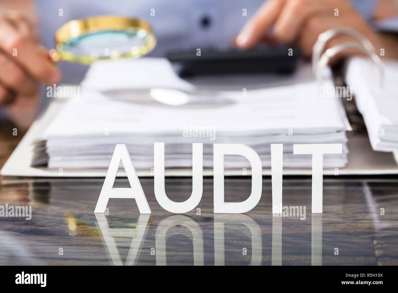 Financial Data Analyst With Audit Text On Desk Stock Photo - Alamy