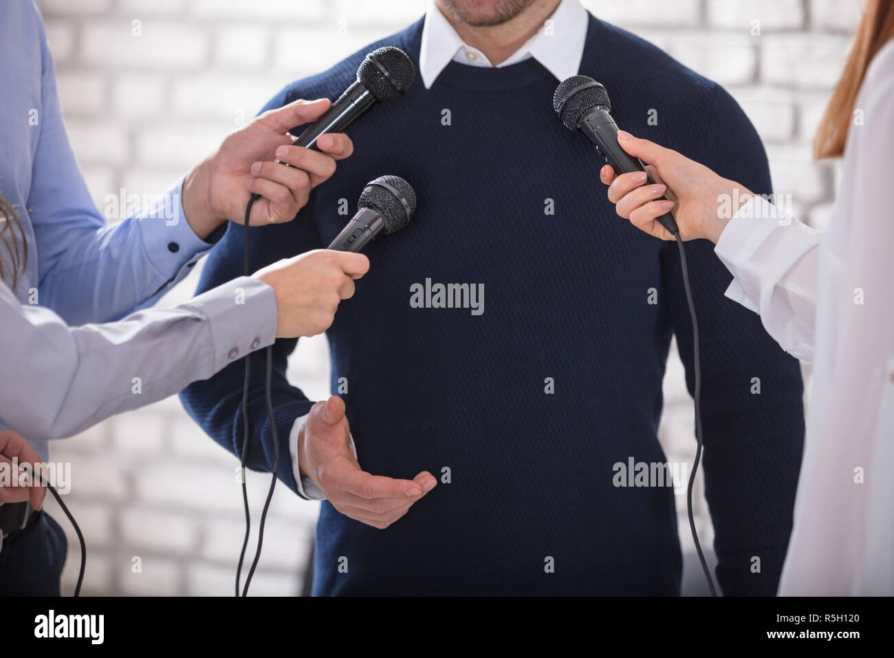 Man Giving Media Interview Stock Photo - Alamy