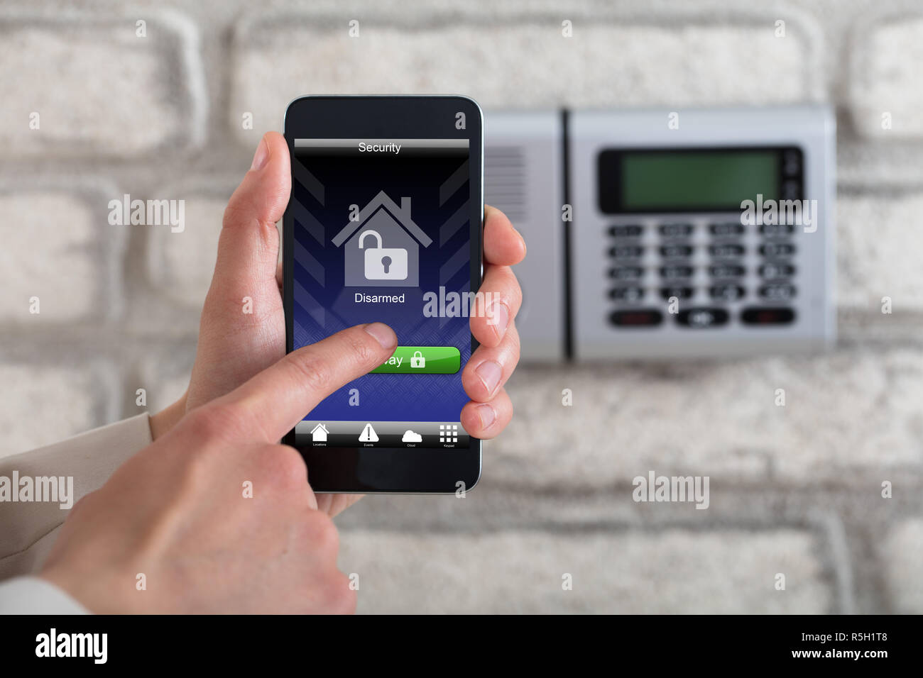 Hand Disarming Security System Of Door Stock Photo - Alamy