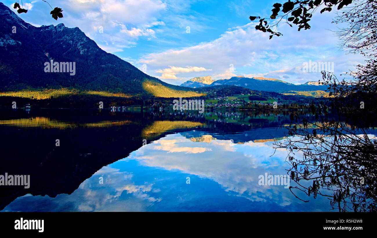 Beautiful panoramic view at Austrian alps lake. Old vintage rural ...