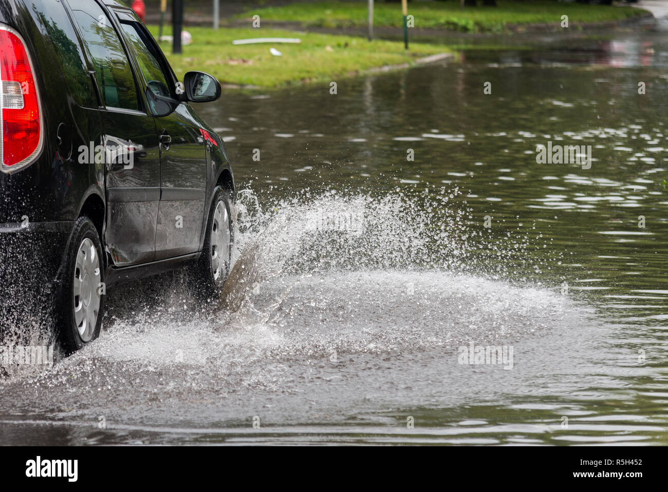 car in water after heavy rain and flood Stock Photo - Alamy