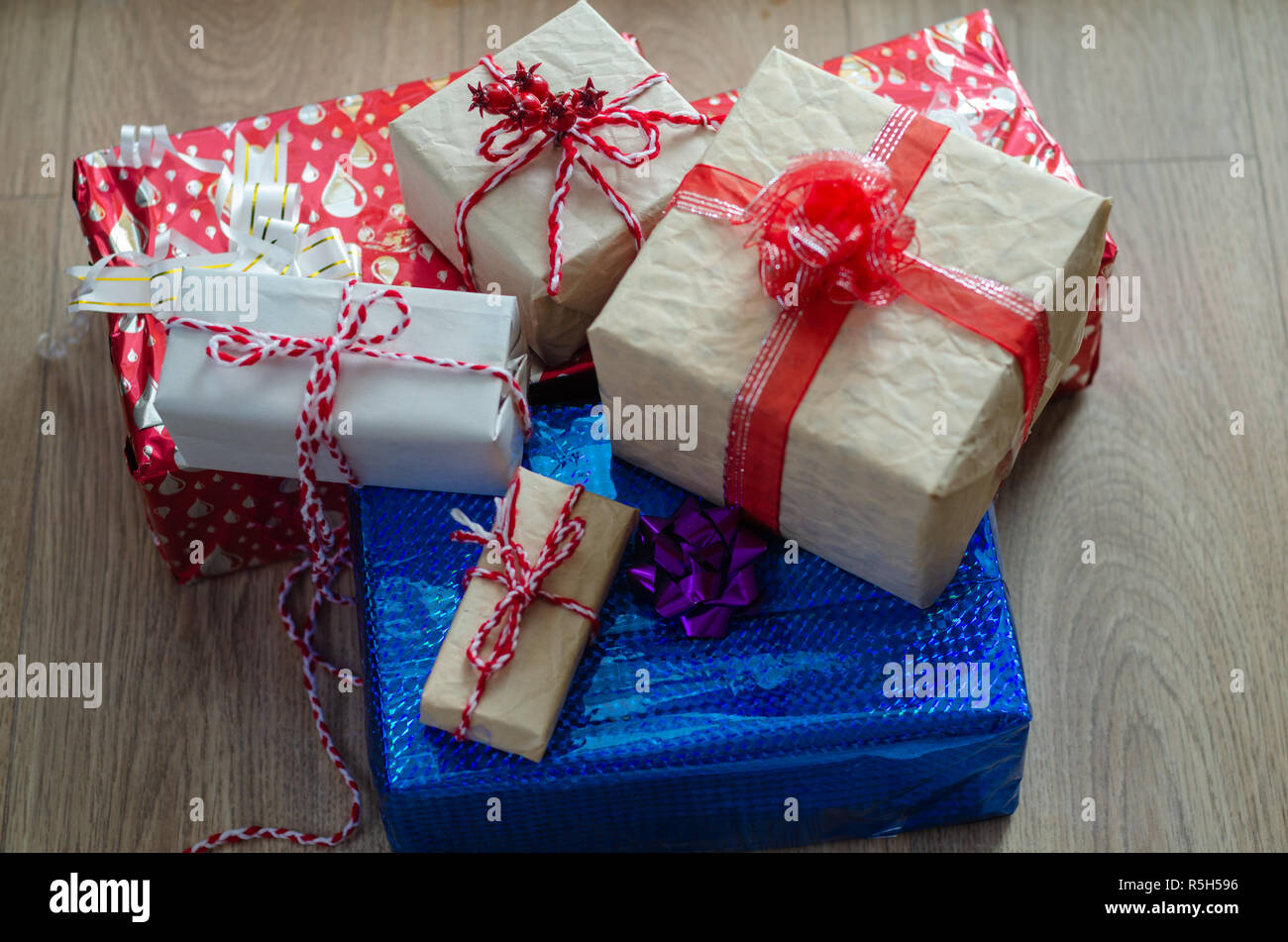 Christmas gift boxs are on the flour Stock Photo - Alamy