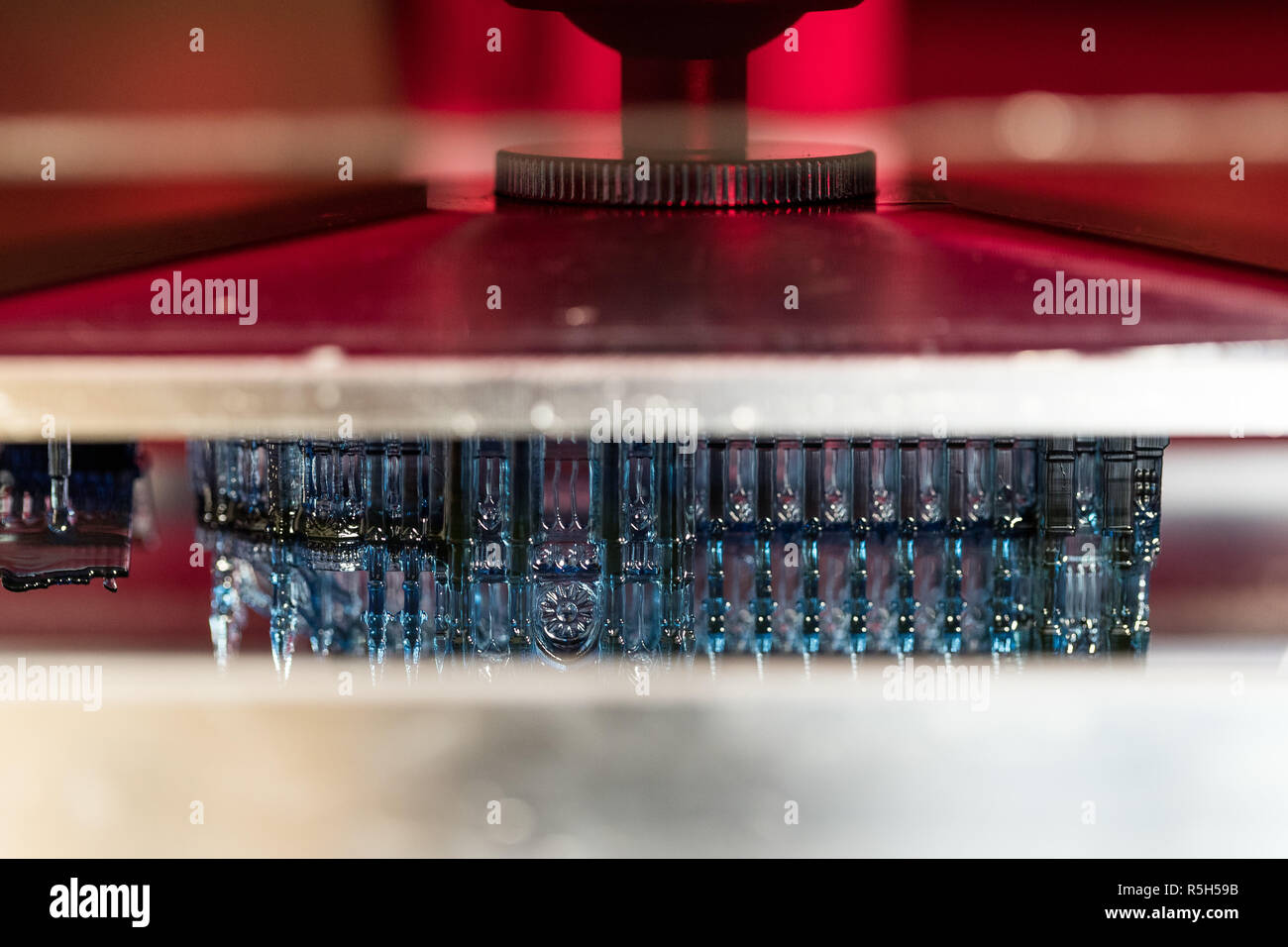 3D Printing Machine printing a piece of plastic Stock Photo - Alamy