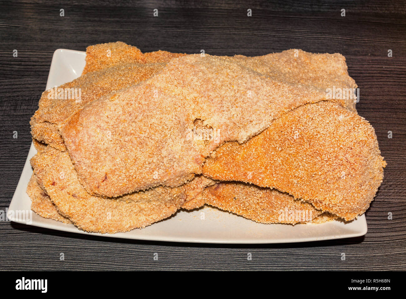 fresh breaded wienerschnitzel Stock Photo - Alamy