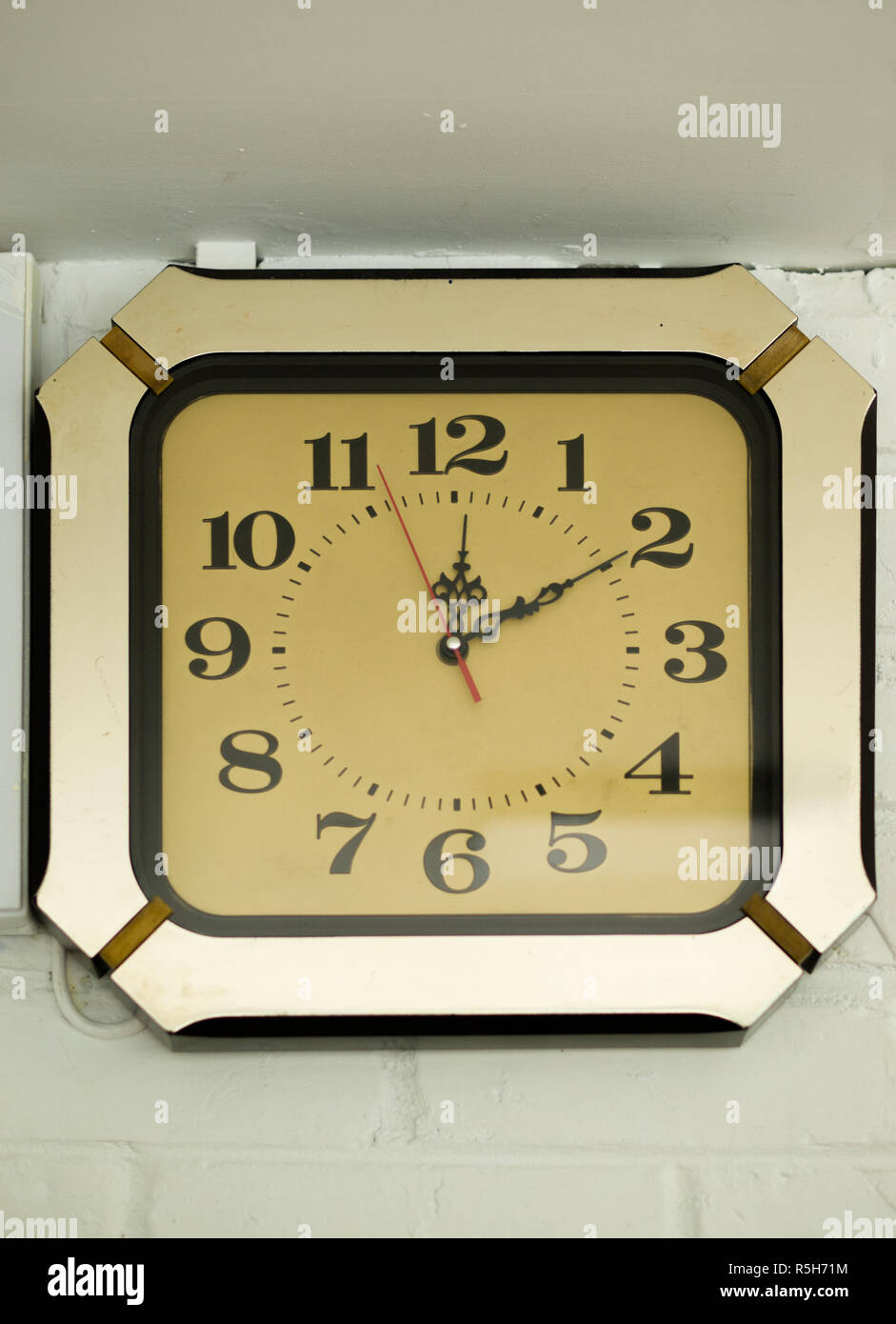 Wall mounted watch hi-res stock photography and images - Alamy