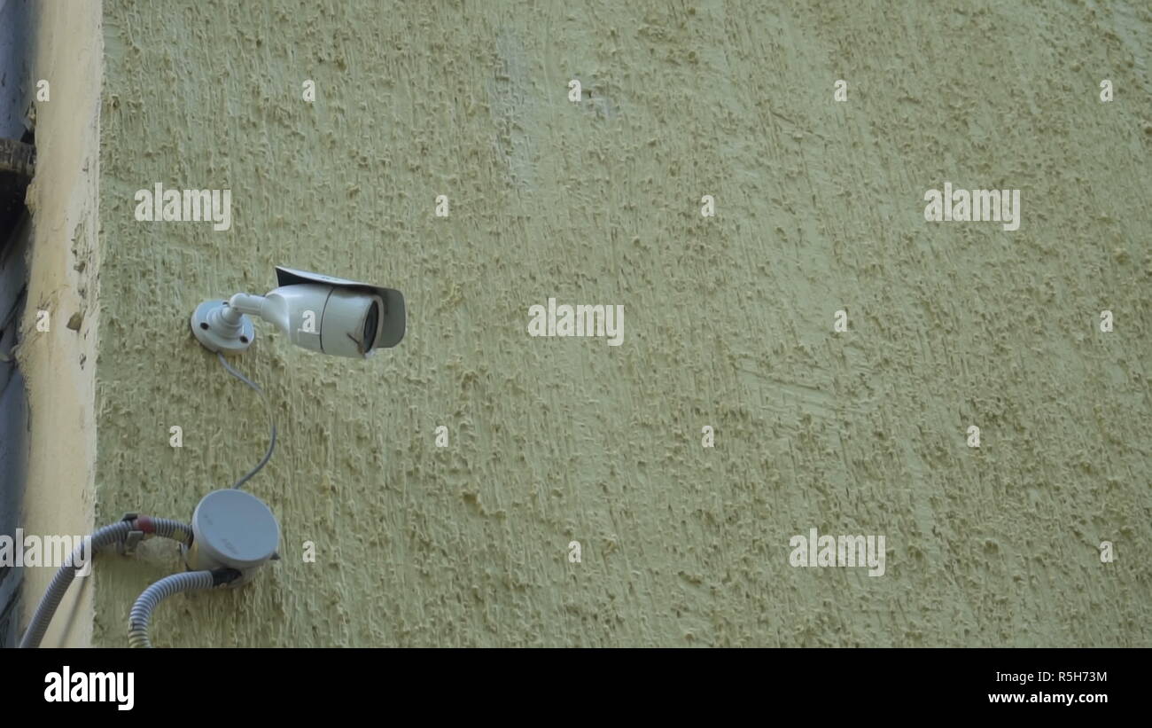 surveillance camera on the wall of children's art school Stock Photo ...