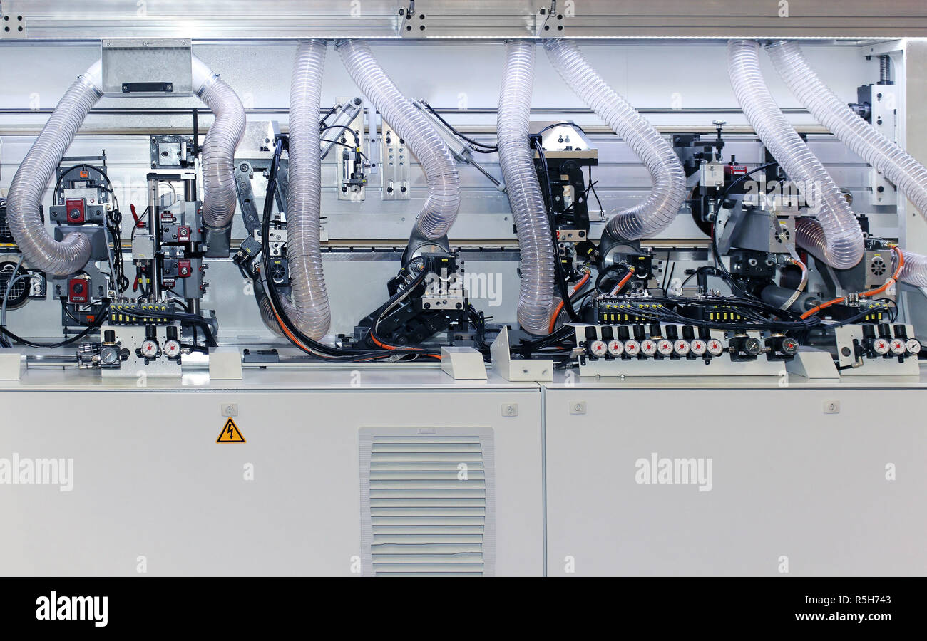 Modern woodworking machine Stock Photo - Alamy