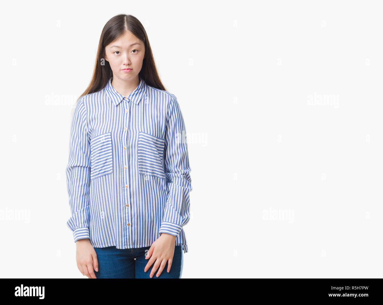 Young Chinese woman over isolated background depressed and worry for ...