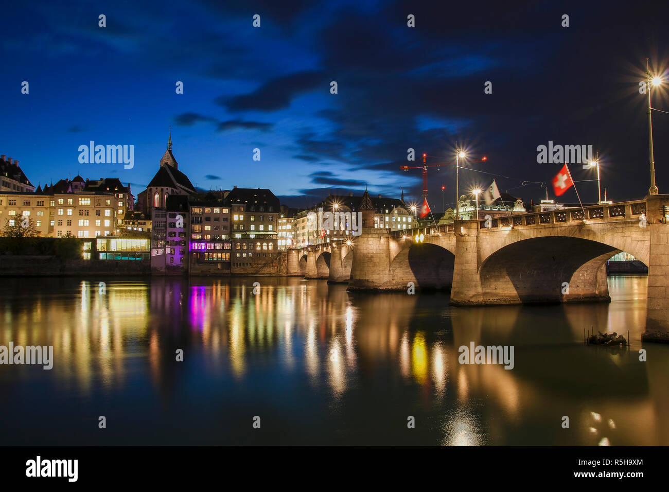 Middle bridge over the river Rhine in Basel, Switzerland, illuminated ...