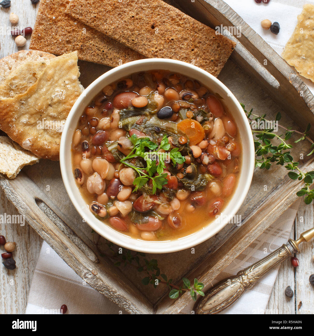 Cooked legumes and vegetables in a bowl Stock Photo - Alamy