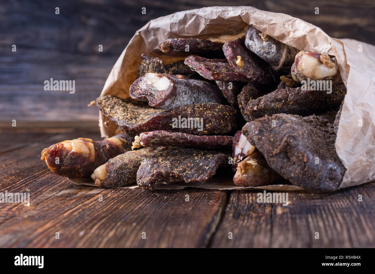 A lot of varied meat in craft pack. Varied sausage. Front view Stock ...