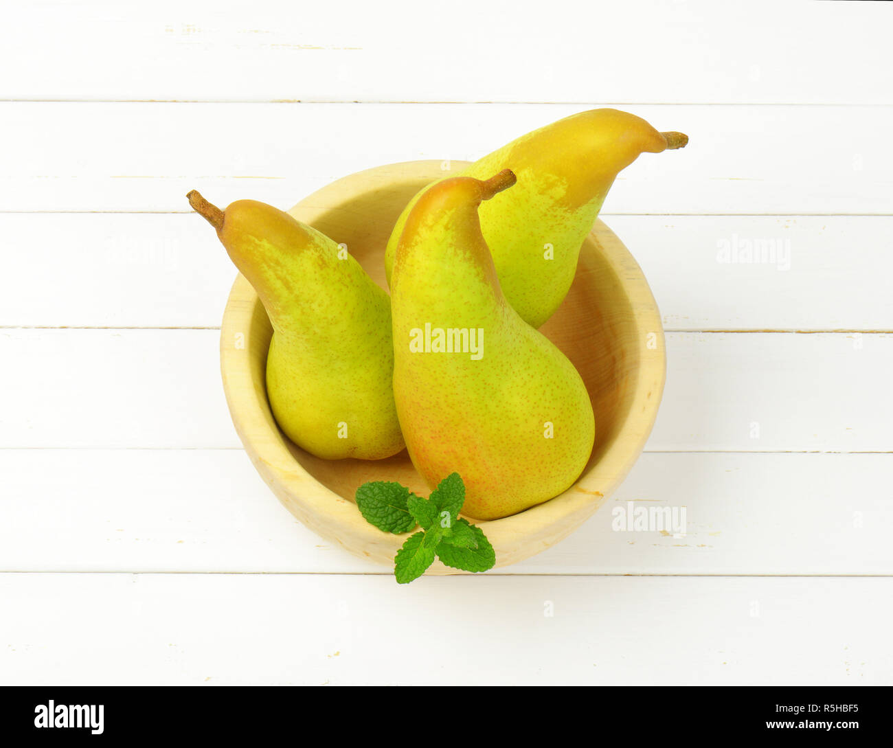 three yellow pears Stock Photo - Alamy