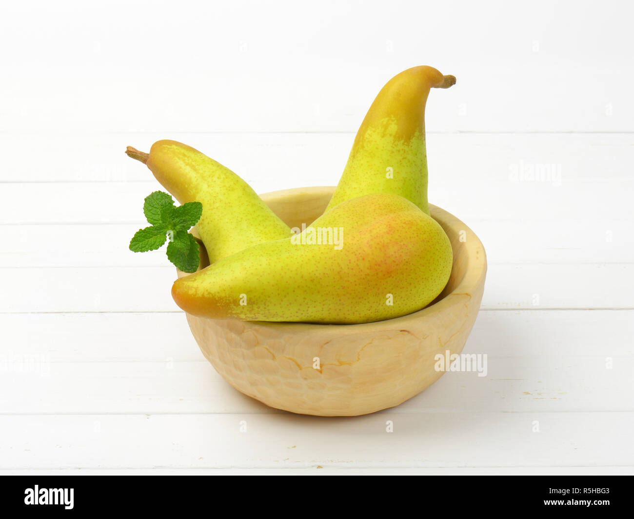 three yellow pears Stock Photo - Alamy