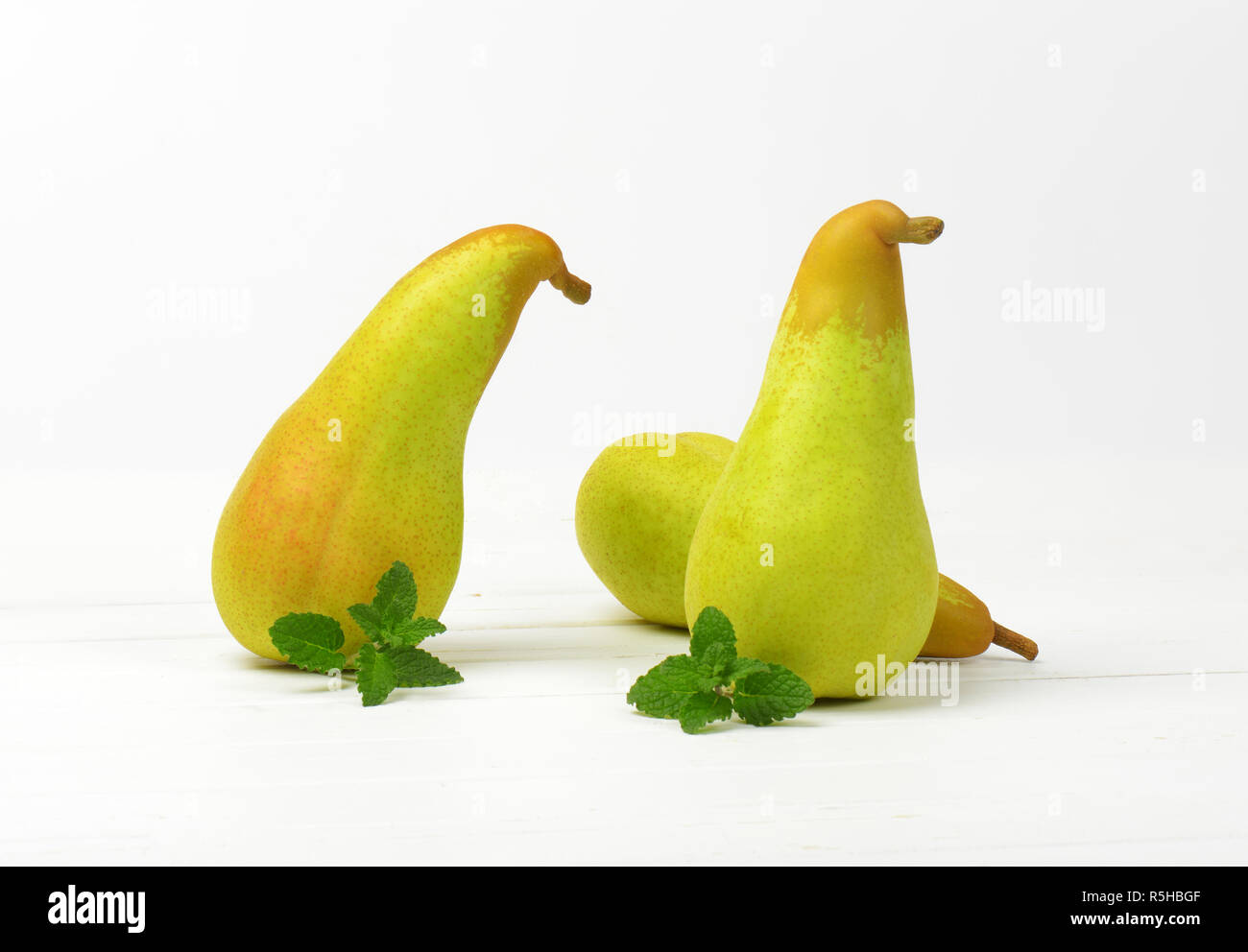 three yellow pears Stock Photo - Alamy