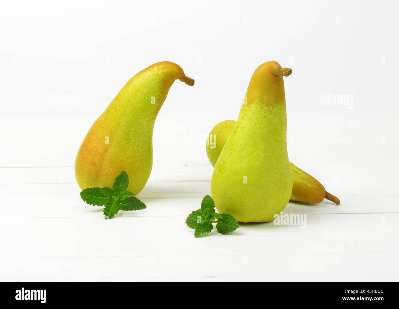 three yellow pears Stock Photo - Alamy