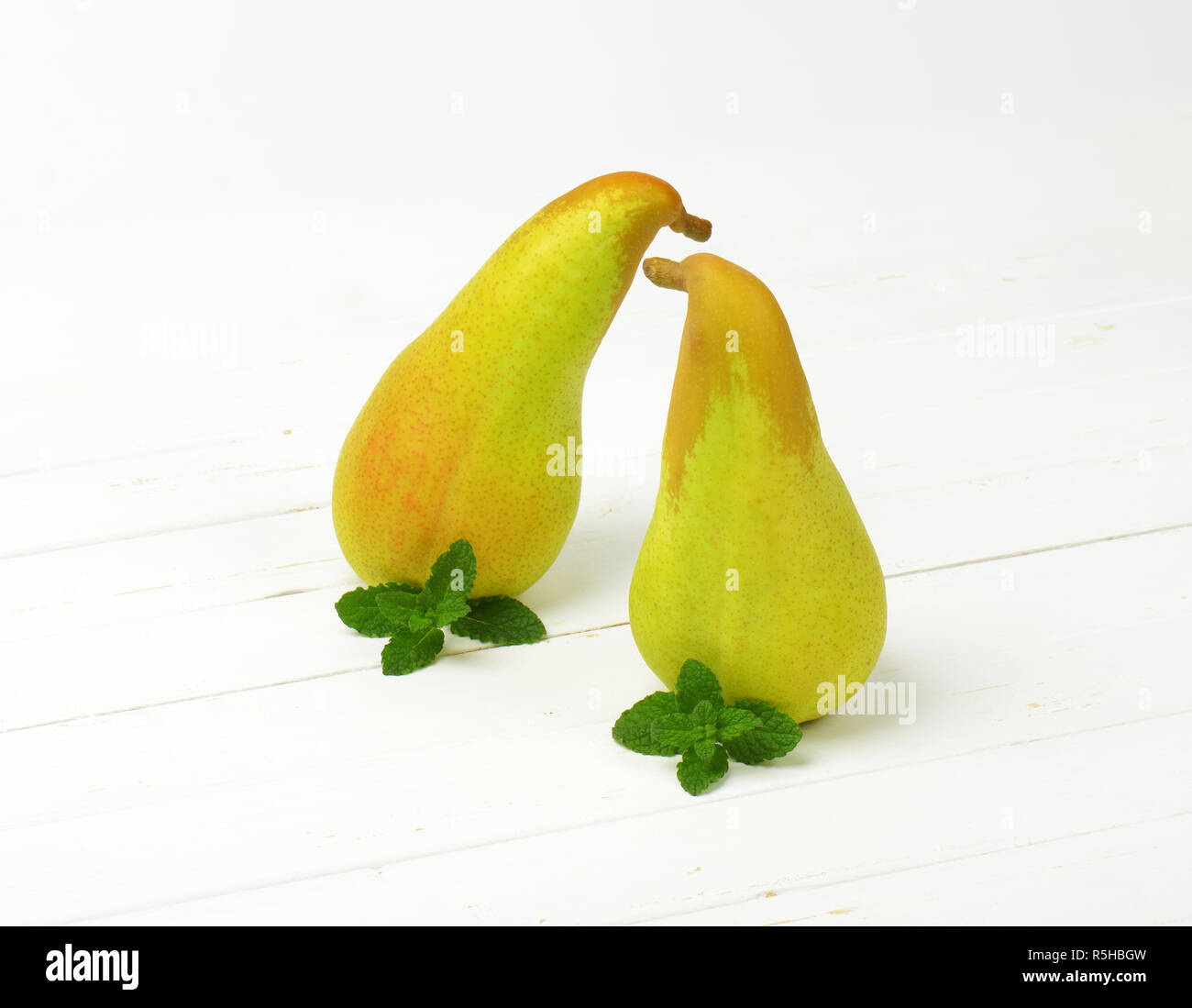 two yellow pears Stock Photo - Alamy