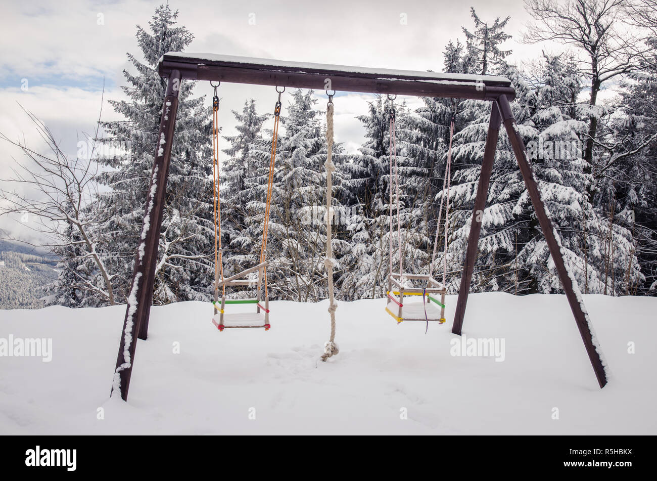 Playground in winter hi-res stock photography and images - Alamy