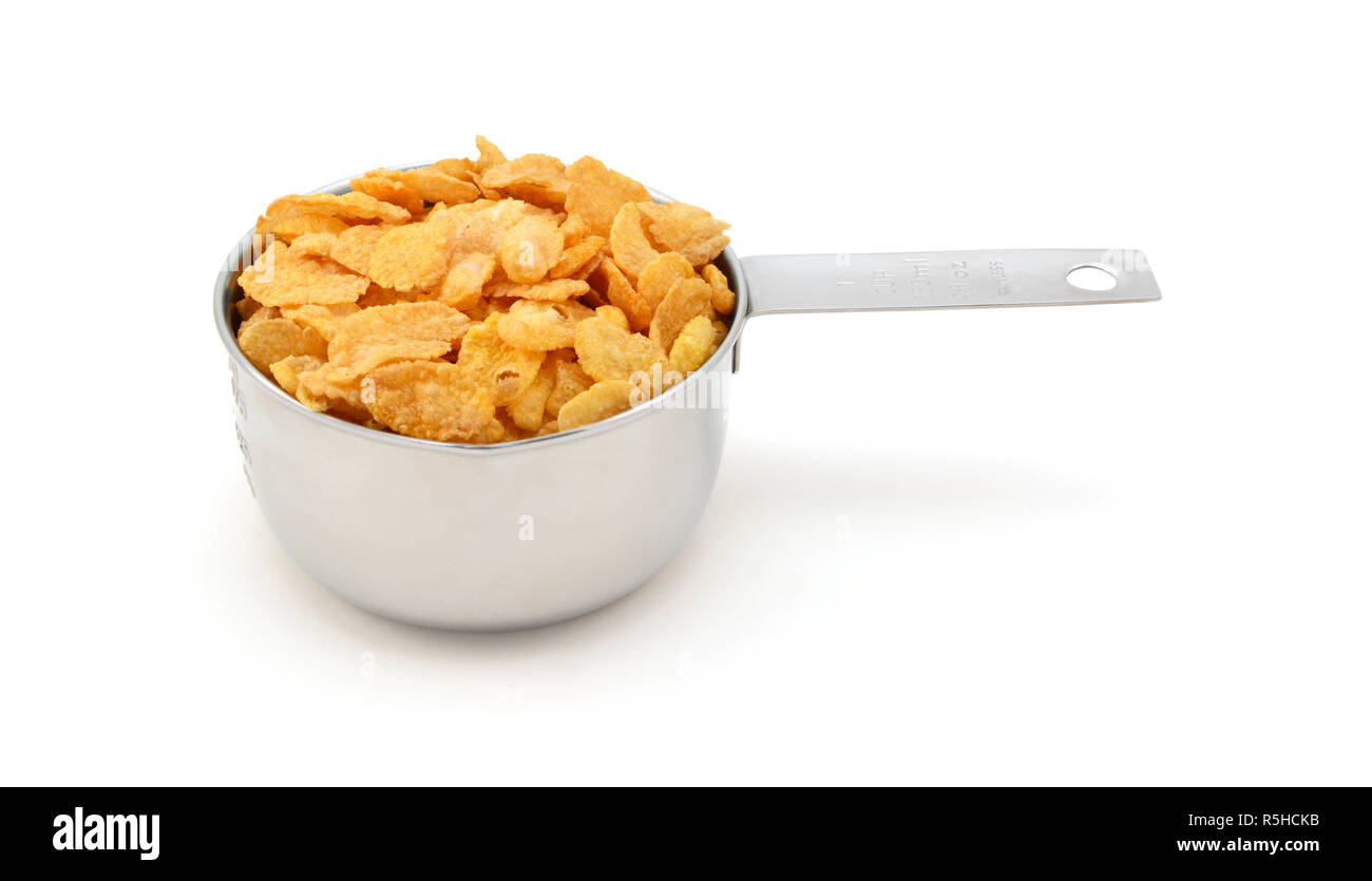Corn flakes breakfast cereal in a measuring cup Stock Photo - Alamy