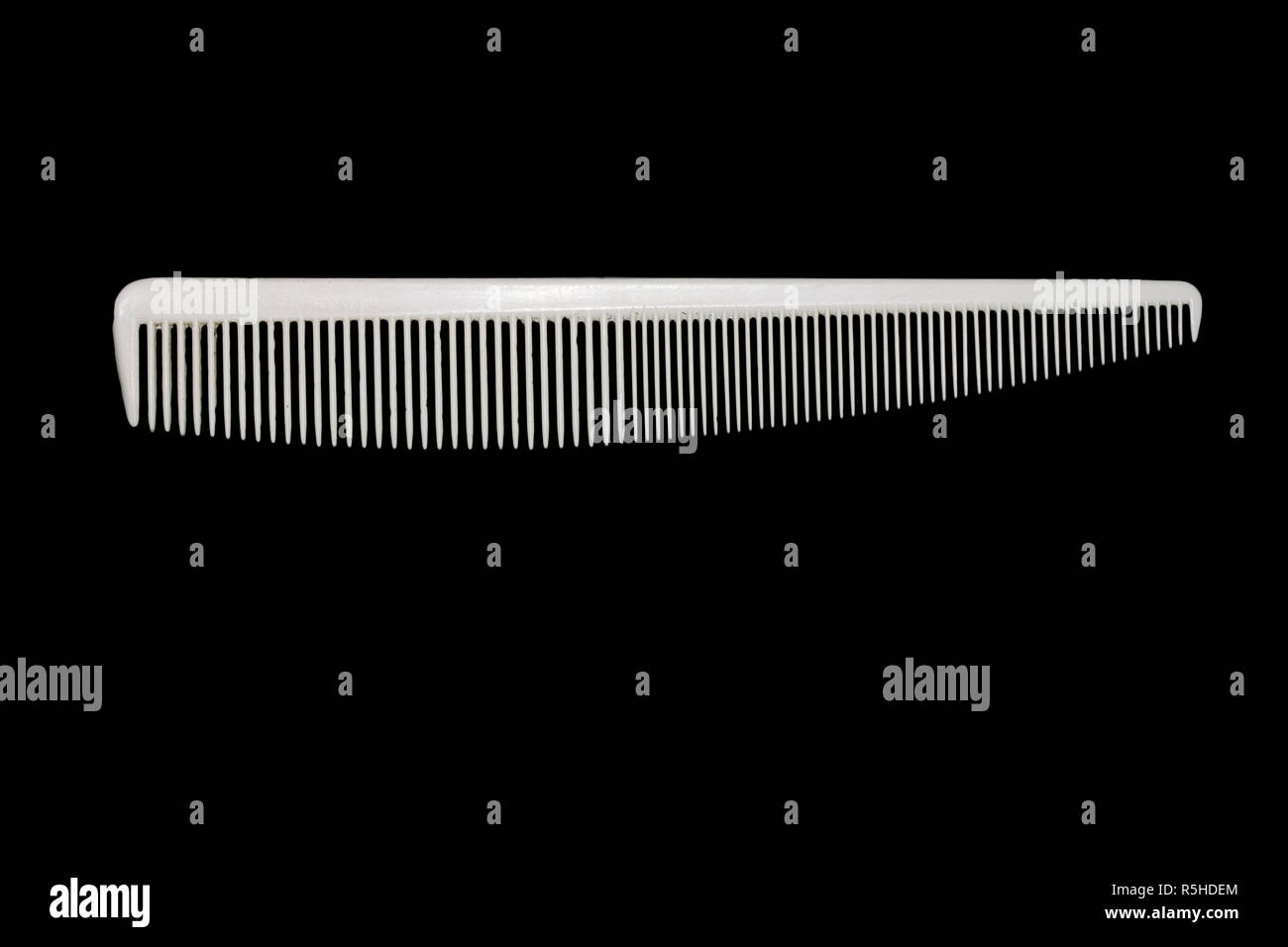 white comb black background Stock Photo - Alamy