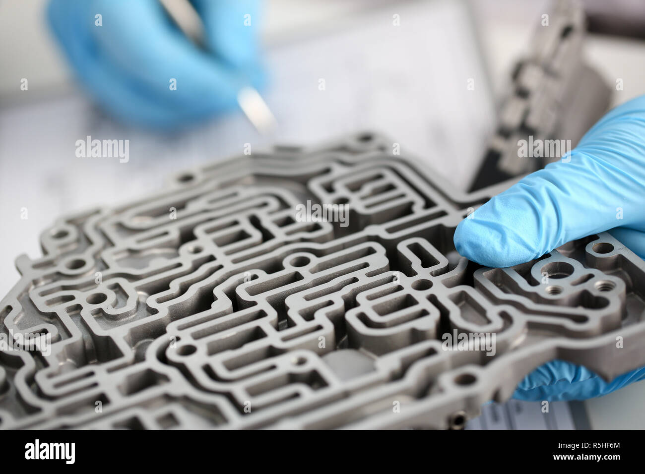 The auto repair service repairman in automatic Stock Photo - Alamy