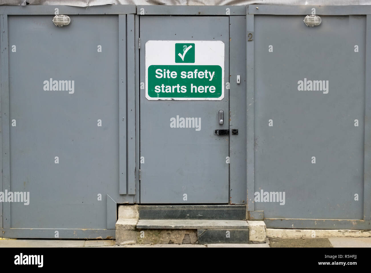 Site safety starts here think safe construction sign Stock Photo - Alamy