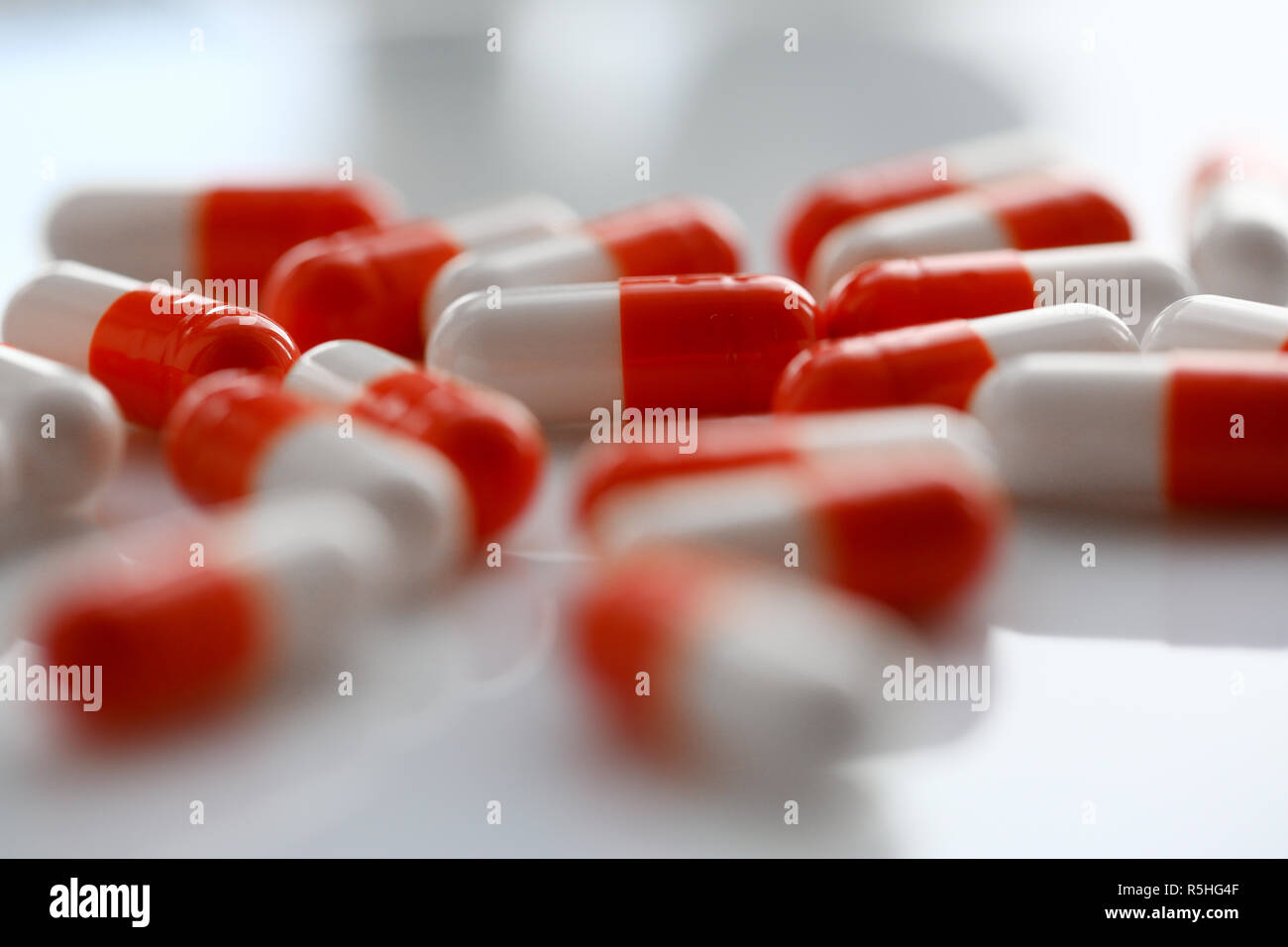 Tablets scattered on the table of the Stock Photo - Alamy