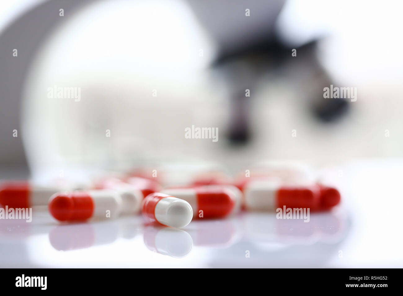 Tablets scattered on the table of the Stock Photo - Alamy