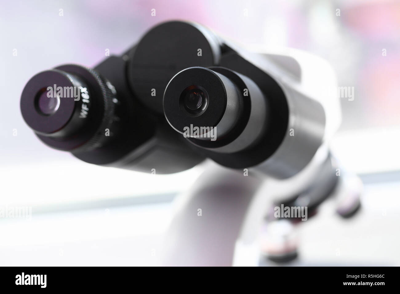 The head microscope on the background of Stock Photo - Alamy