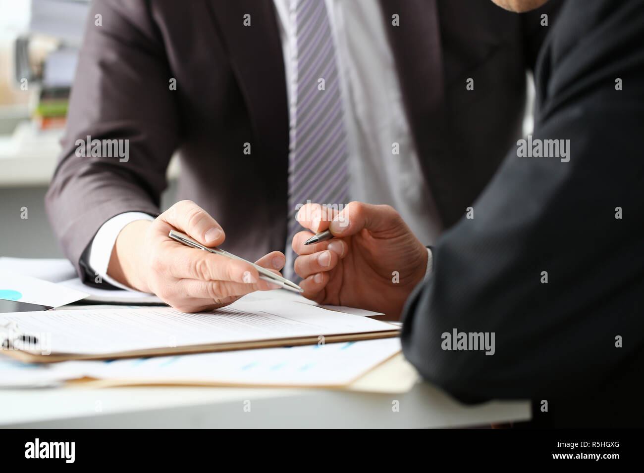 Male arm in suit and tie fill form clipped Stock Photo - Alamy