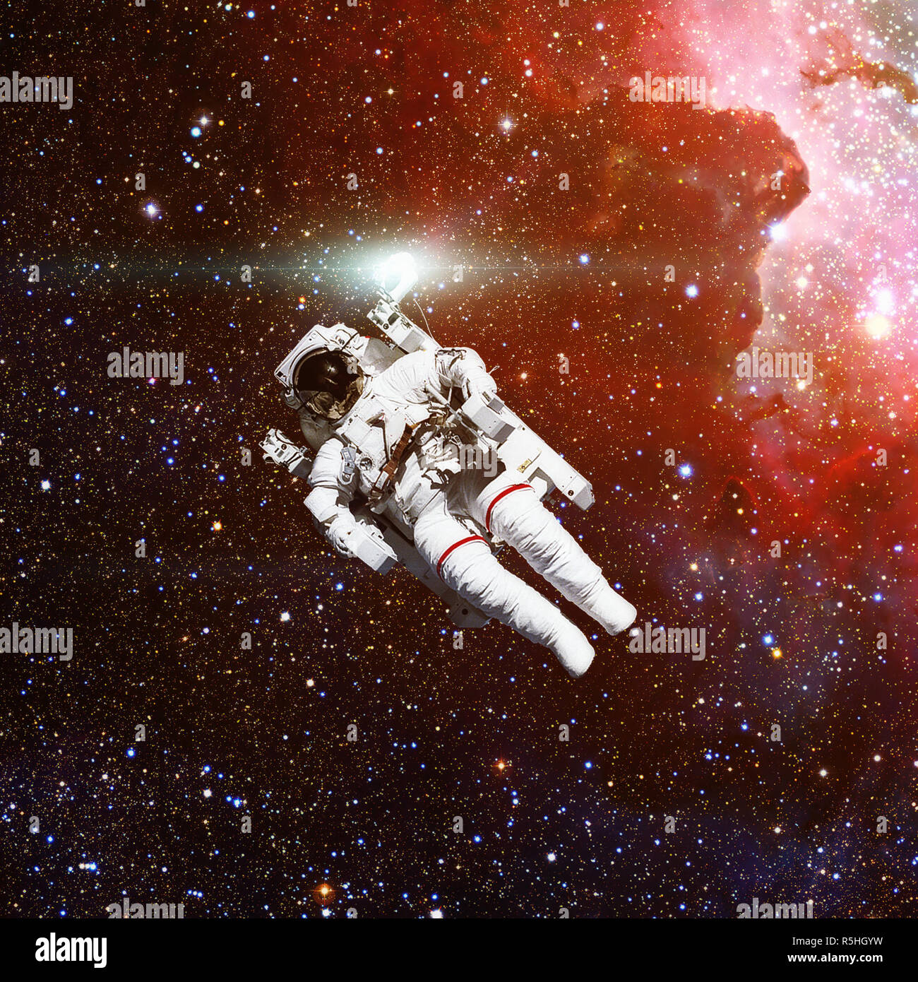 Astronaut in outer space. Nebula and stars on the background Stock ...