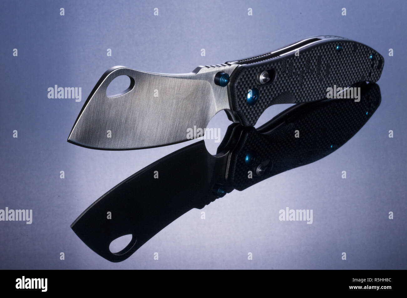 Folding knife with a wide blade. Knife diagonally. Knife isolate Stock ...