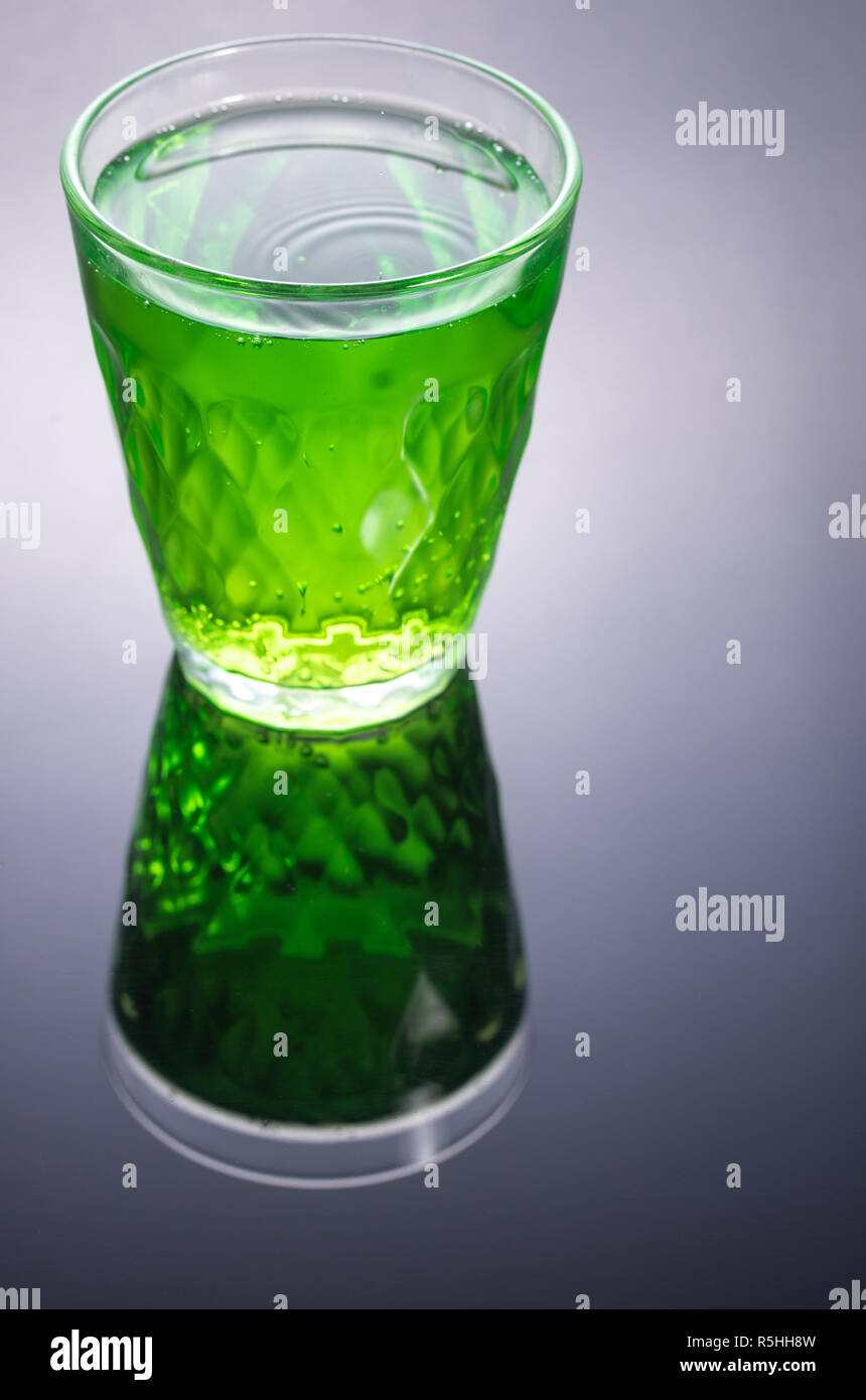 Drink green. Color drink in a glass. Vertical frame Stock Photo - Alamy