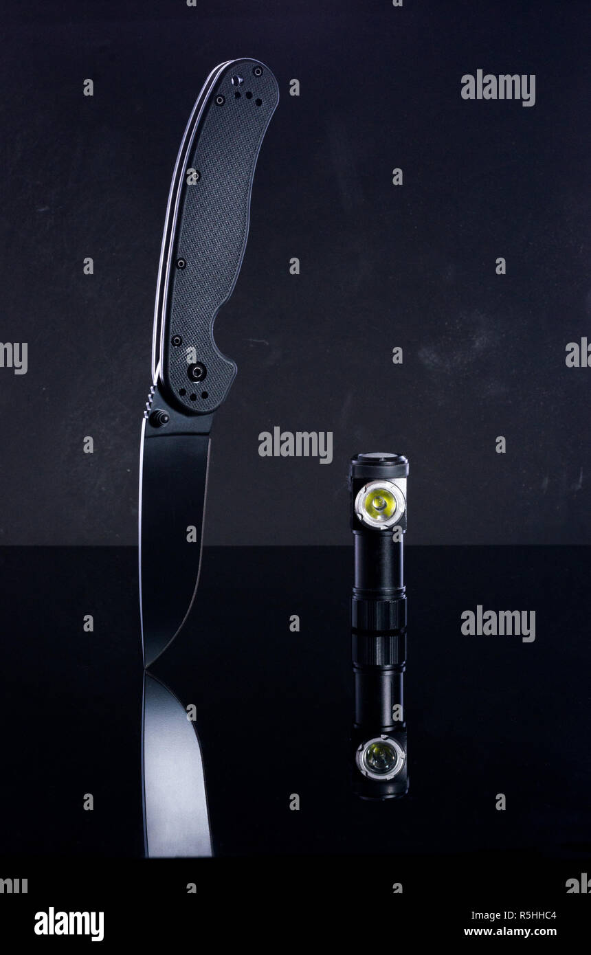 Stacking photo of the knife. Sharp photo of a knife and flashlight ...