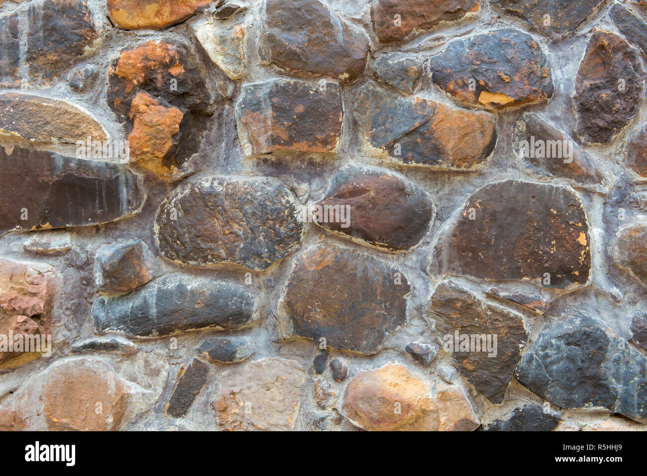 Background of stone wall texture abstract for design Stock Photo - Alamy
