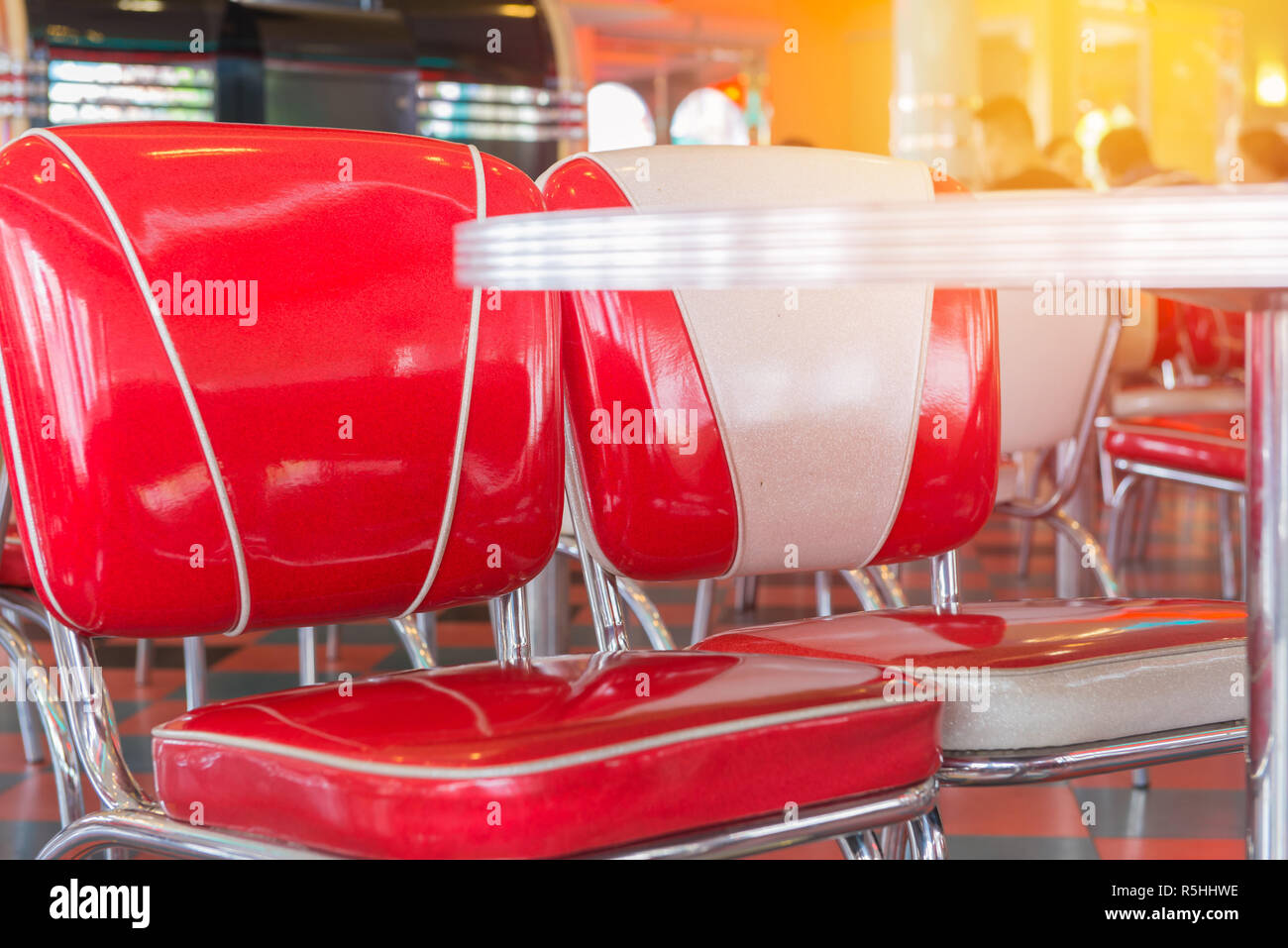 red table and chairs vintage style in restaurant Stock Photo - Alamy