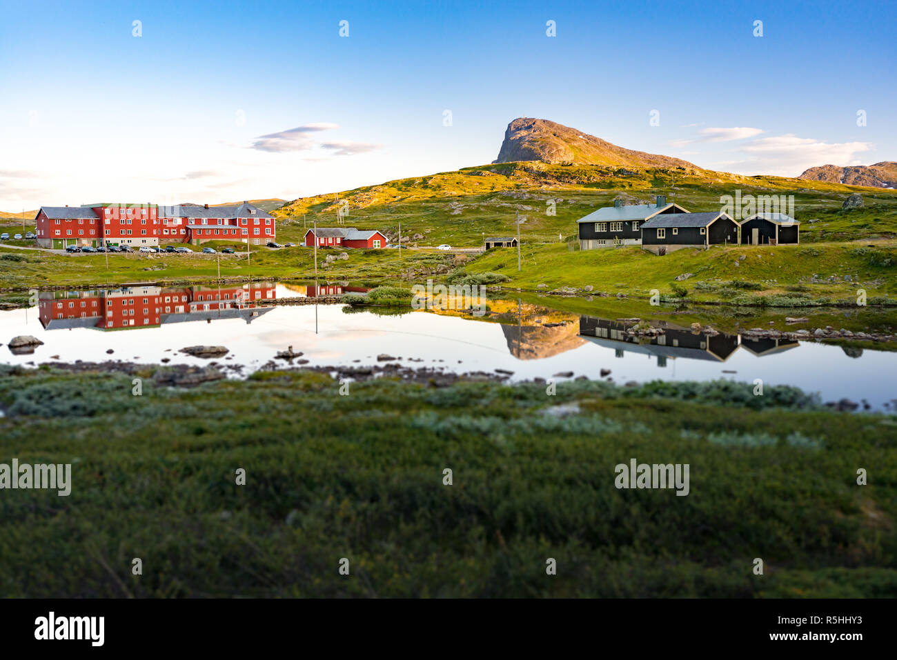 Norway country houses. Meadows and mountains Stock Photo - Alamy