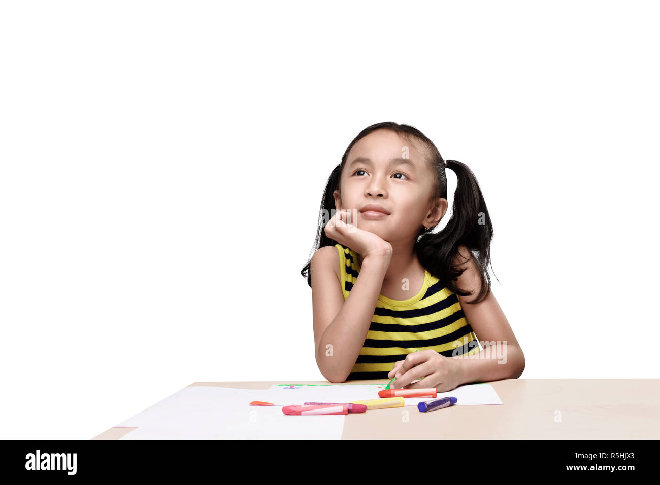 Portrait of asian kid drawing with crayon Stock Photo - Alamy