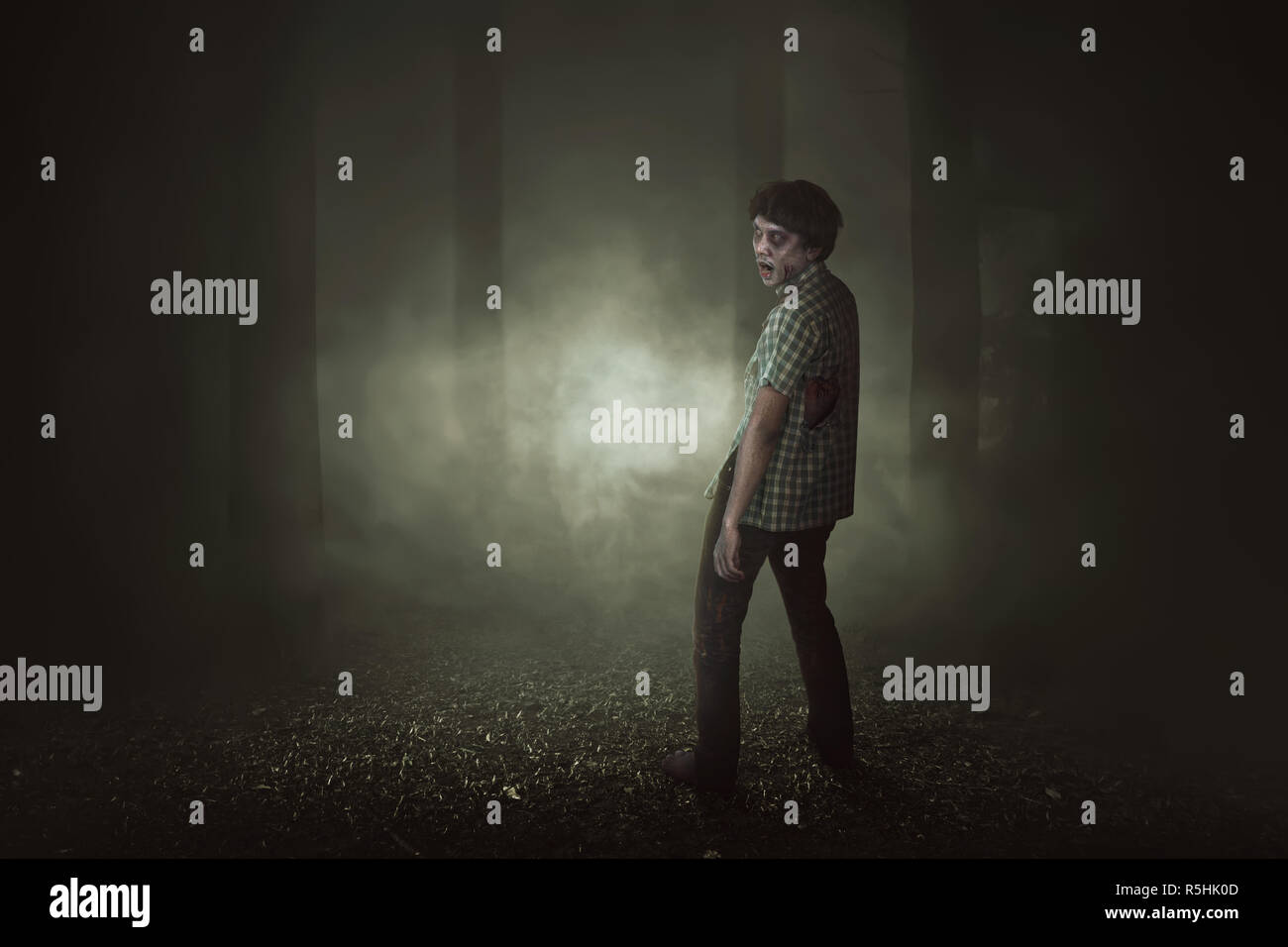 Creepy asian zombie man looking back Stock Photo - Alamy