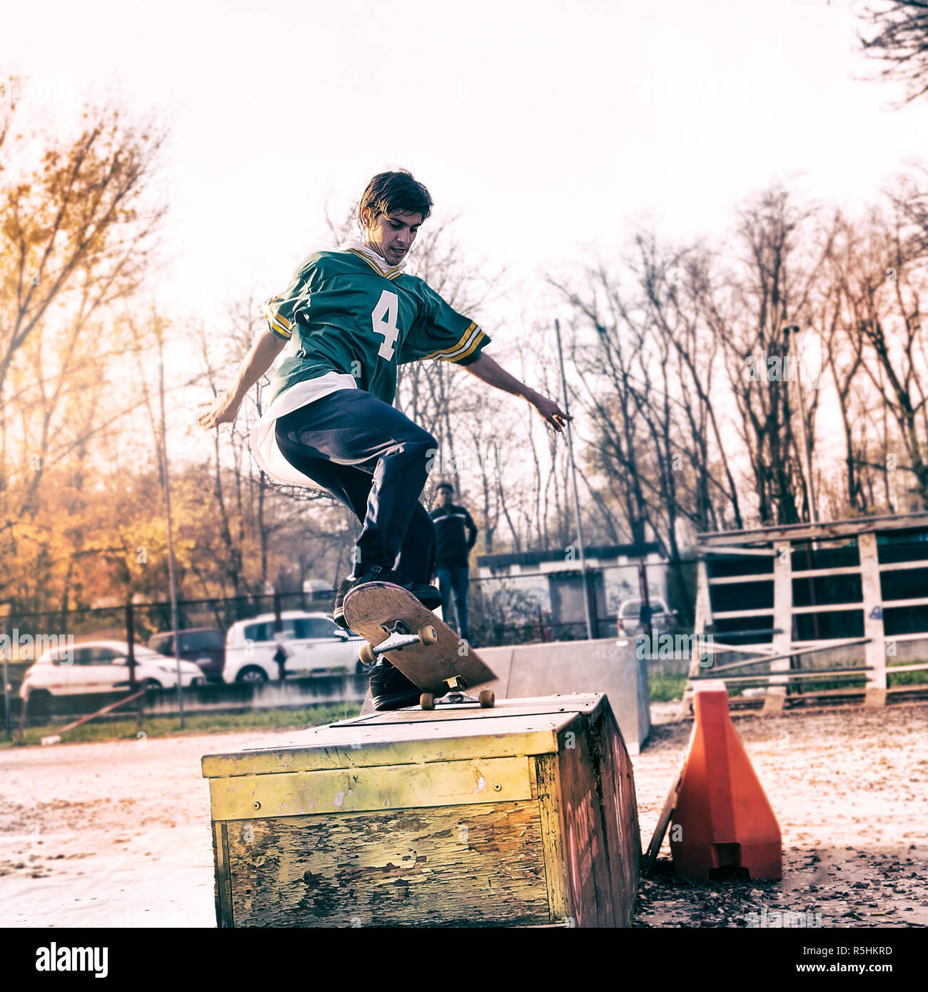 young skateboarder jumping on a ramp outdoor Stock Photo - Alamy
