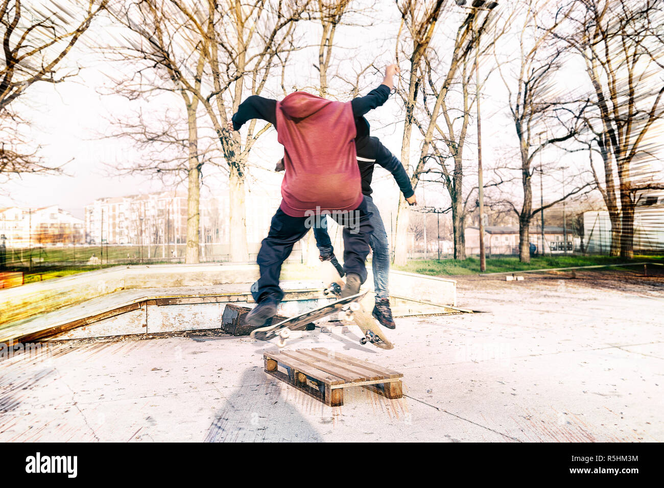 young skateboarder jumping on a ramp outdoor Stock Photo - Alamy